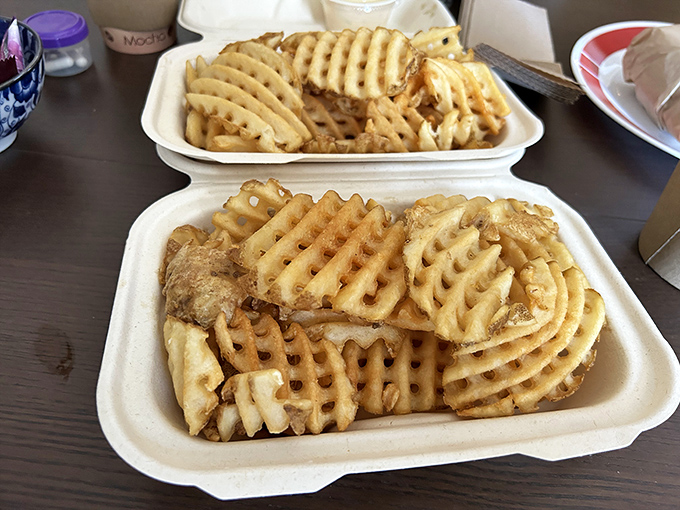 Waffle fries: the perfect sidekick to sandwich superheroes&mdash;crispy, golden, and ready to soak up any wayward sauce that dares escape your main attraction.