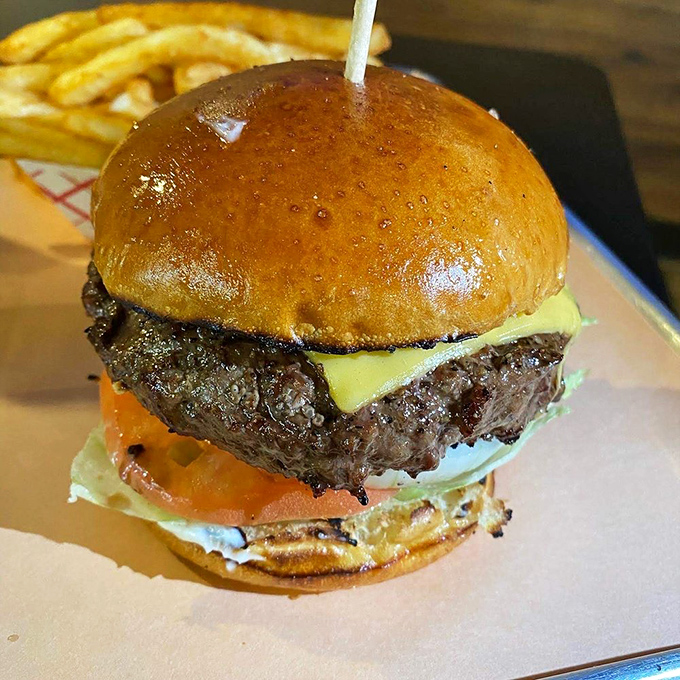 This isn't just any burger&mdash;it's a Wagyu masterpiece that would be the star at most restaurants but somehow plays a supporting role here.