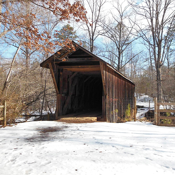 Snow transforms the bridge into a winter wonderland straight out of a Currier and Ives print—proof that history looks good in any season.