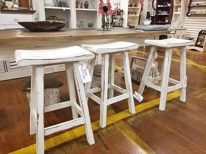 Bar stools with the perfect amount of distressing&mdash;like jeans that come pre-worn, except these earned their character honestly through decades of supporting humanity.