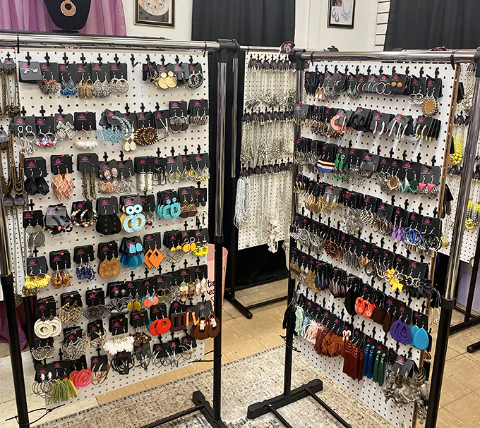 Accessories displayed with the meticulous care of a museum curator who understands that sometimes the perfect earring is all that stands between ordinary and extraordinary.