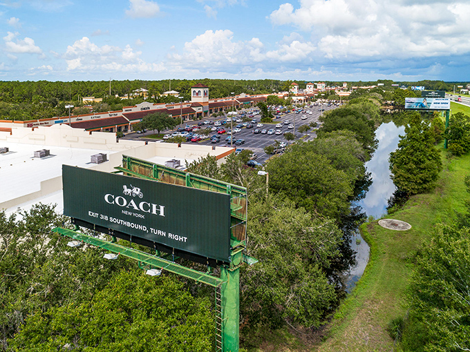 From above, St. Augustine Premium Outlets reveals its true scale &ndash; a sprawling retail kingdom nestled among Florida's lush greenery.