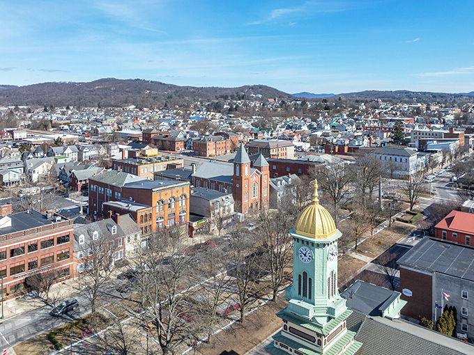 This aerial perspective showcases Sunbury's distinctive clock tower, church spires, and compact downtown&mdash;all surrounded by the natural beauty that makes this affordable gem so livable.