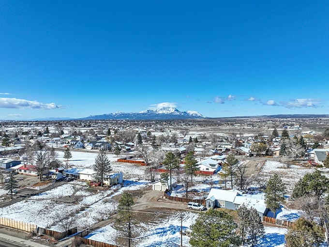 Aerial views reveal a manageable town size where you can memorize routes without GPS constantly recalculating your existence.