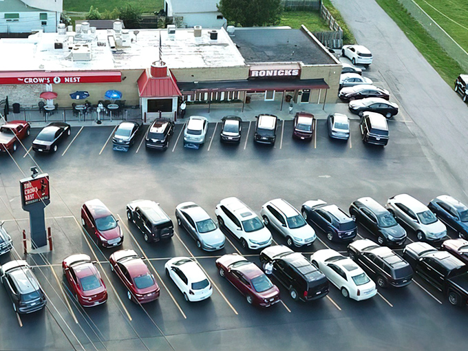 An aerial view shows a parking lot that's actually full – always the best restaurant review.