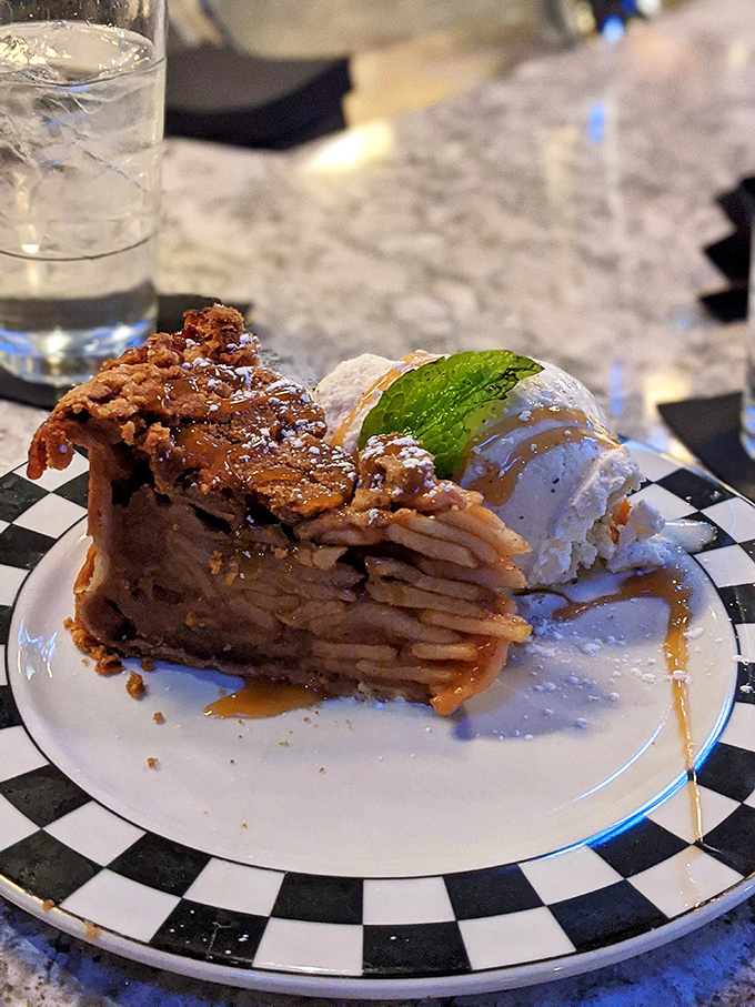 Apple pie that makes you understand why this dessert became an American icon, with its flaky crust, caramelized filling, and obligatory scoop of vanilla ice cream.