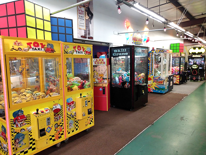 The arcade section: where parents suddenly remember quarters aren't just for laundry and kids discover games that don't require Wi-Fi or updates.