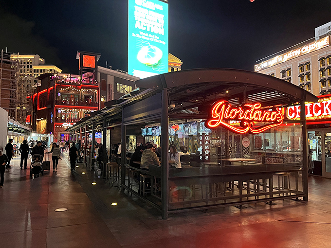 Giordano's after dark, when the Strip comes alive and pizza cravings intensify. The perfect pit stop between casino adventures.