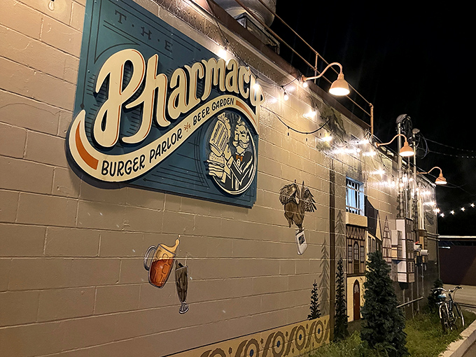 As night falls, The Pharmacy's illuminated sign becomes a beacon of hope for the hungry&mdash;a lighthouse guiding ships to safe, delicious harbor.