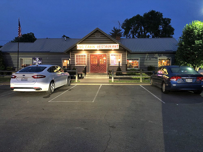 Even after sunset, those red doors glow with promise of warm hospitality and hot meals waiting inside this Hurricane Mills landmark.