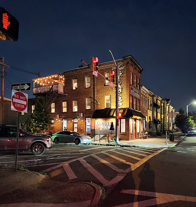 As night falls, L.P. Steamers glows like a lighthouse for the hungry, its corner location illuminated against the Baltimore sky&mdash;a beacon of deliciousness.