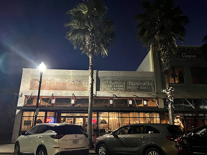 Even after dark, those palm trees and vintage facade draw hungry souls like moths to a very delicious flame.