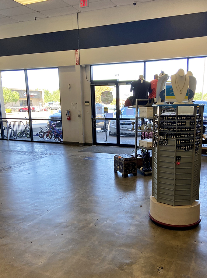 Near the entrance, jewelry displays stand sentinel, sparkling with possibility&mdash;because someone else's discarded accessories might become your signature piece.