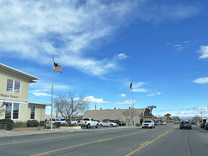 American flags flutter against Ridgecrest's brilliant blue skies, a small-town Main Street where parking spots are plentiful and pace is pleasantly slow.