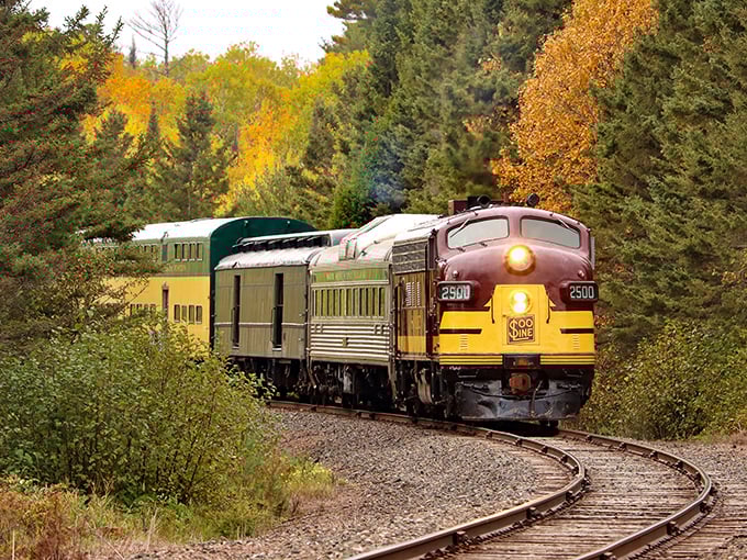 Around the bend it comes, a symphony of autumn colors playing backdrop to this classic locomotive &ndash; proof that the journey truly is the destination.