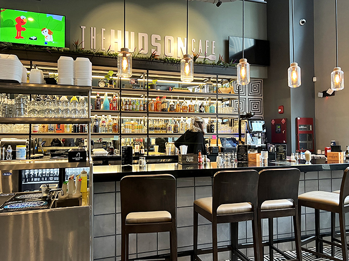 The bar area gleams with promise&mdash;where morning mimosas and Bloody Marys transform ordinary breakfasts into weekend celebrations.