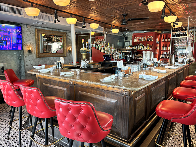 The bar area's red leather stools invite you to perch awhile&mdash;perhaps for a mimosa or Bloody Mary to complete the brunch experience.