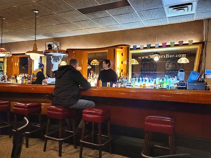 The bar at Miller's isn't just where you order&mdash;it's where stories are exchanged, friendships are formed, and burger dreams come true.