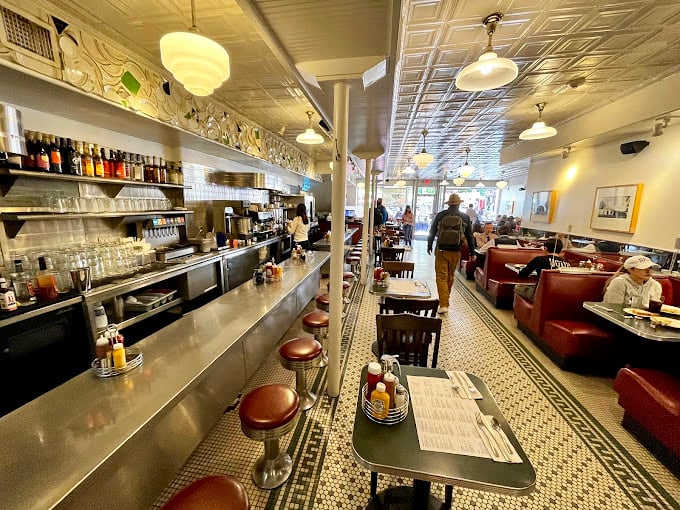 The counter and booths tell stories of countless meals shared, coffee cups refilled, and pie-induced happiness throughout the decades.
