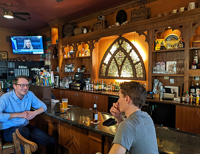 Behind every great Irish pub is a bar that feels like it's been there forever, complete with stained glass that filters light into liquid gold.