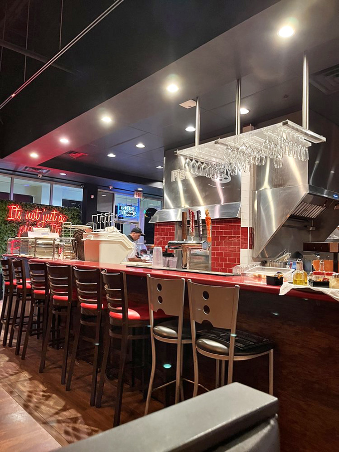 The open kitchen isn't just for show&mdash;it's theater where dough-tossing and flame-kissing create the perfect prelude to your meal.