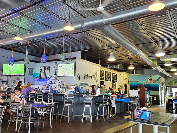 The bar area buzzes with locals and visitors alike, all united by the universal language of "Did you try the chowder yet? Life-changing!"