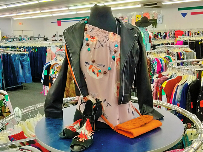 This faux leather jacket styled with colorful accessories proves thrift shopping is absolutely an art form.