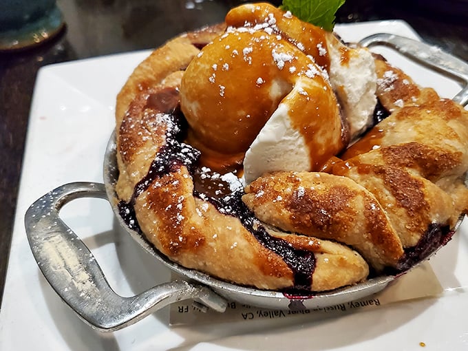 Blueberry cobbler that makes you understand why people write songs about dessert&mdash;warm, bubbling fruit beneath a golden crust with ice cream slowly surrendering.