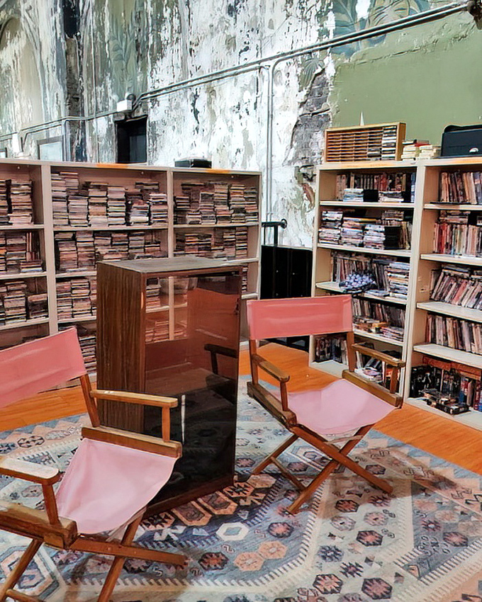 Director's chairs face shelves of books in this literary corner&mdash;the perfect spot to contemplate which stories deserve a second life in your home.