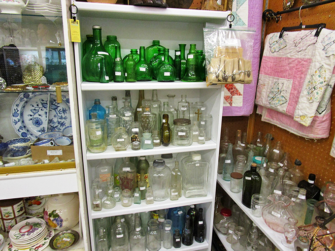 The bottle collection gleams with vintage glass in every shade of green and blue &ndash; from medicine bottles to soda pop vessels of bygone eras. 