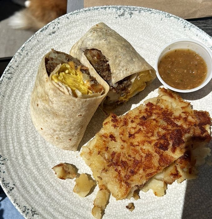 Breakfast goes portable with this hearty burrito alongside crispy hash browns &ndash; the morning meal that keeps Nashville fueled all day.