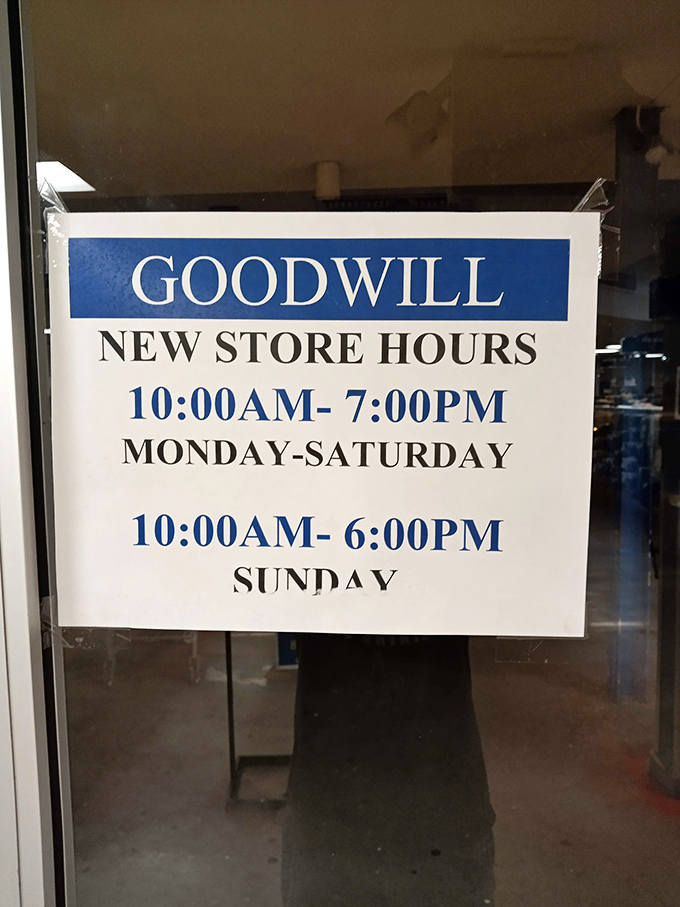 The store hours sign reveals the treasure hunting schedule &ndash; open seven days a week for maximum bargain-finding opportunities.