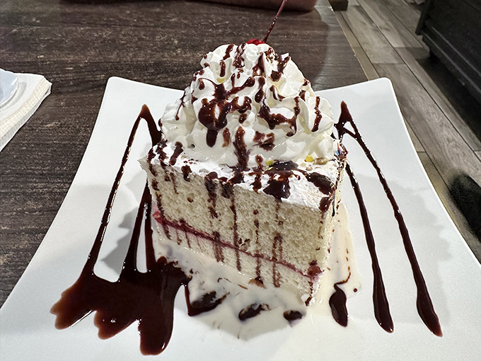 A slice of cake that doesn't just end the meal&mdash;it provides the exclamation point. Whipped cream mountains with chocolate river valleys.