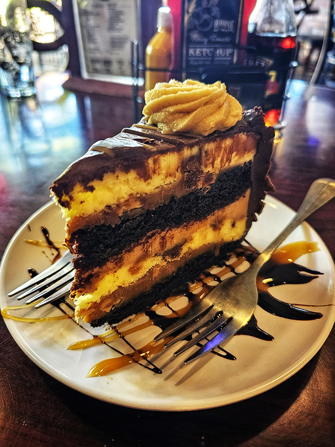 Not your average chocolate cake. This towering masterpiece of layers, frosting and caramel drizzle is worth every calorie-laden forkful.