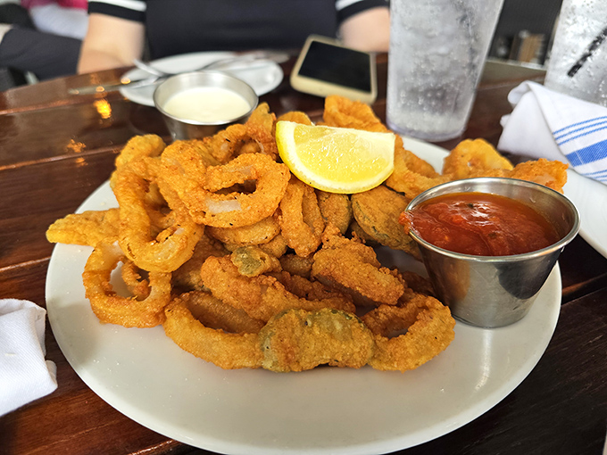 Fried calamari so perfectly golden and crisp, it makes you wonder if Neptune himself is back in the kitchen.
