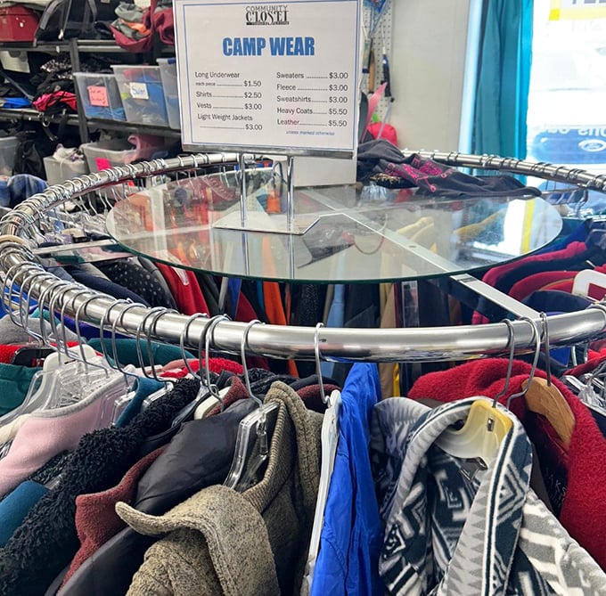 The "Camp Wear" circular rack&mdash;where outdoor adventures begin without breaking the bank. Montana's unofficial uniform available at prices that leave money for trail snacks.