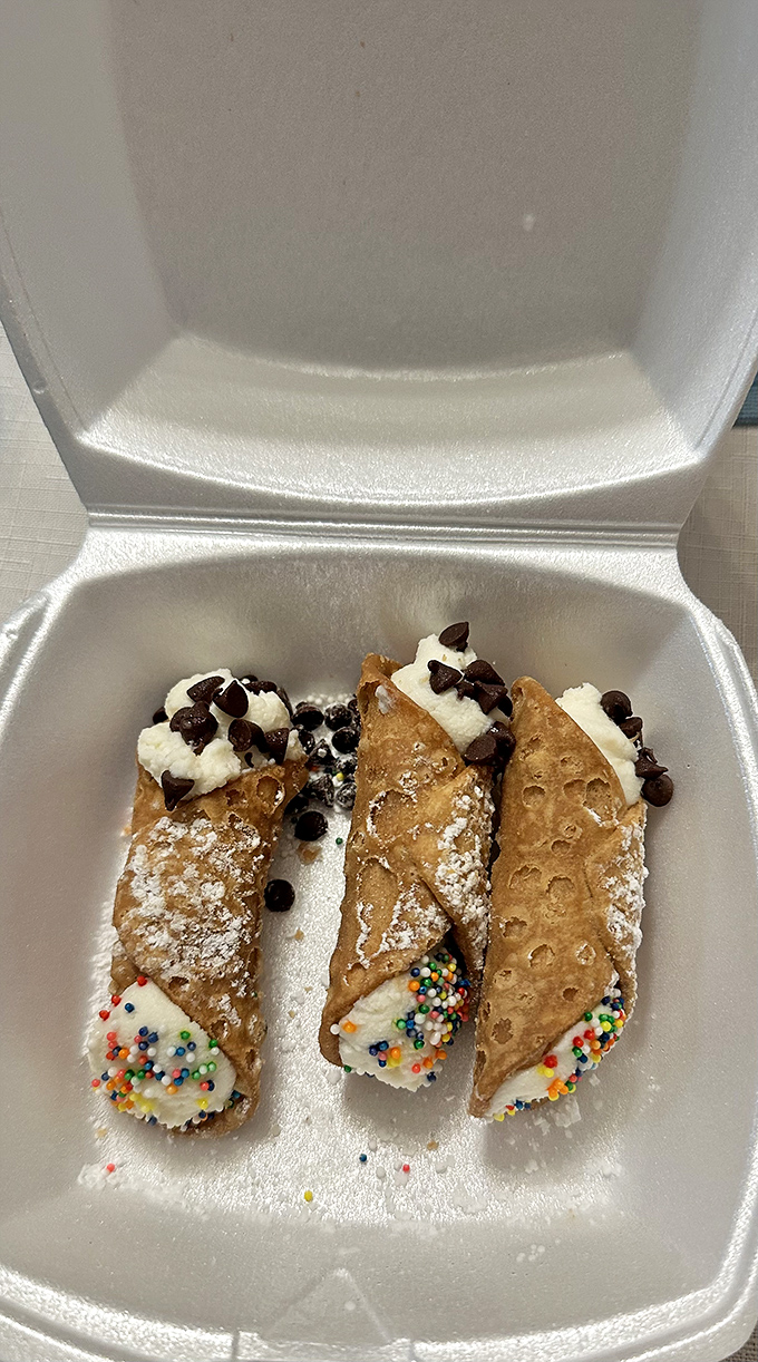 Cannoli that don't just end the meal&mdash;they celebrate it. Crisp shells, creamy filling, and those chocolate chips and sprinkles saying "life is sweet."