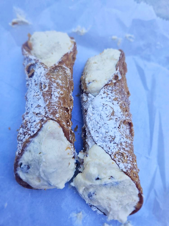 The cannolis that launched a thousand return visits&mdash;crisp shells, creamy filling, and a dusting of powdered sugar that makes these worth every delicious calorie.