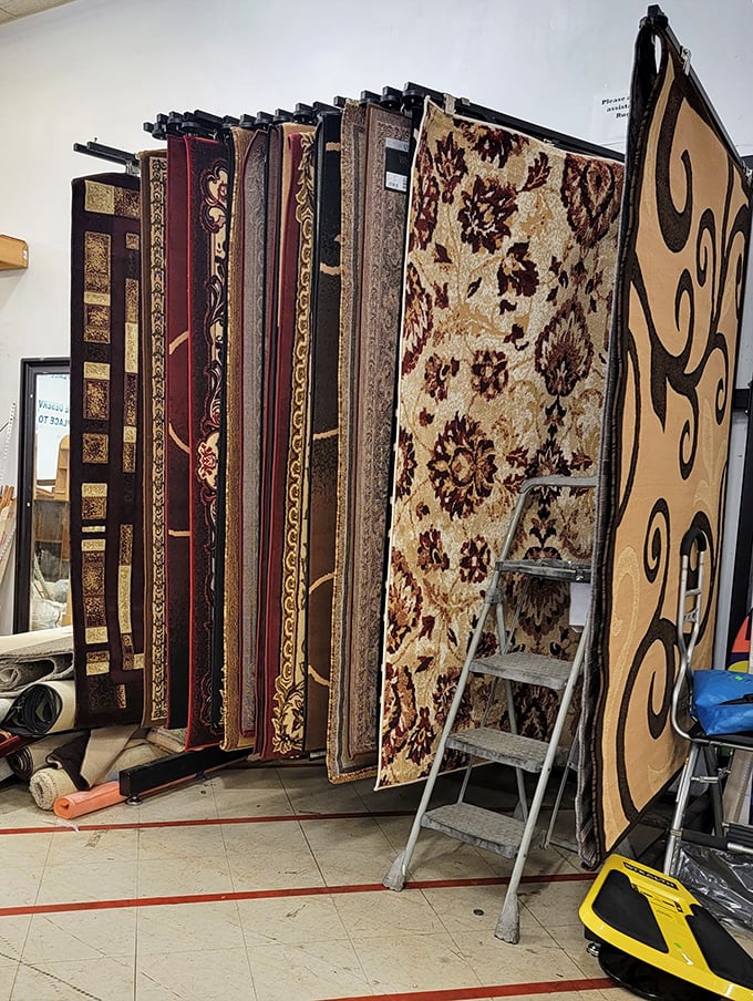 The carpet display &ndash; where floor coverings hang like artwork, waiting to transform your room from "meh" to "magnificent" on a budget.