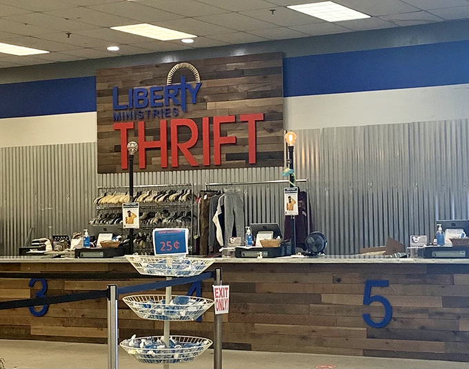 The rustic-modern checkout area welcomes shoppers with numbered stations, ensuring your thrifting victory lap concludes as pleasantly as it began.