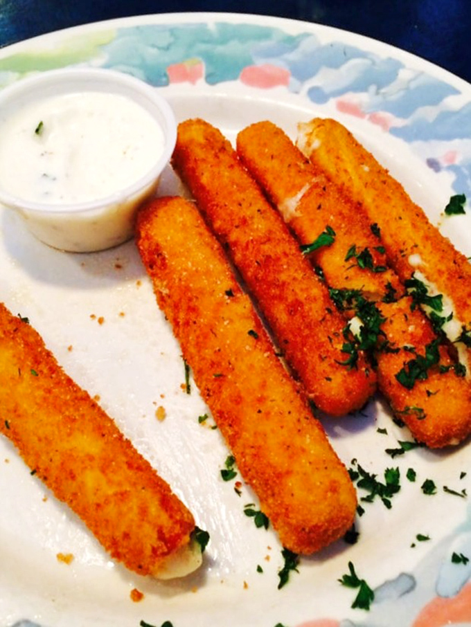 These aren't just cheese sticks – they're crispy, golden time machines transporting you back to when comfort food was life's greatest luxury. One bite and you're twelve again.