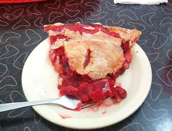 Cherry pie with that perfect balance of sweet and tart&mdash;the kind that makes you consider ordering a second slice immediately.