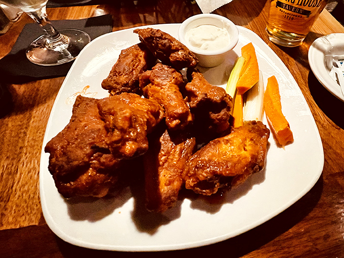 Wings that deliver that perfect trifecta: crispy exterior, juicy interior, and sauce that demands you lick your fingers when you think no one's looking.