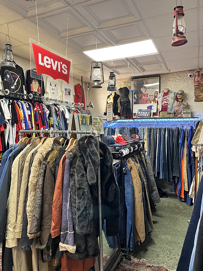 Vintage outerwear hanging like a timeline of fashion history. That perfect leather jacket or fur-collared coat is waiting for its second life.