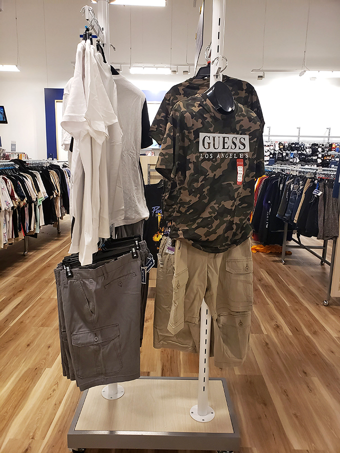 Designer displays showcase name-brand finds like this Guess shirt &ndash; proof that patience and persistence pay off in the thrift world.