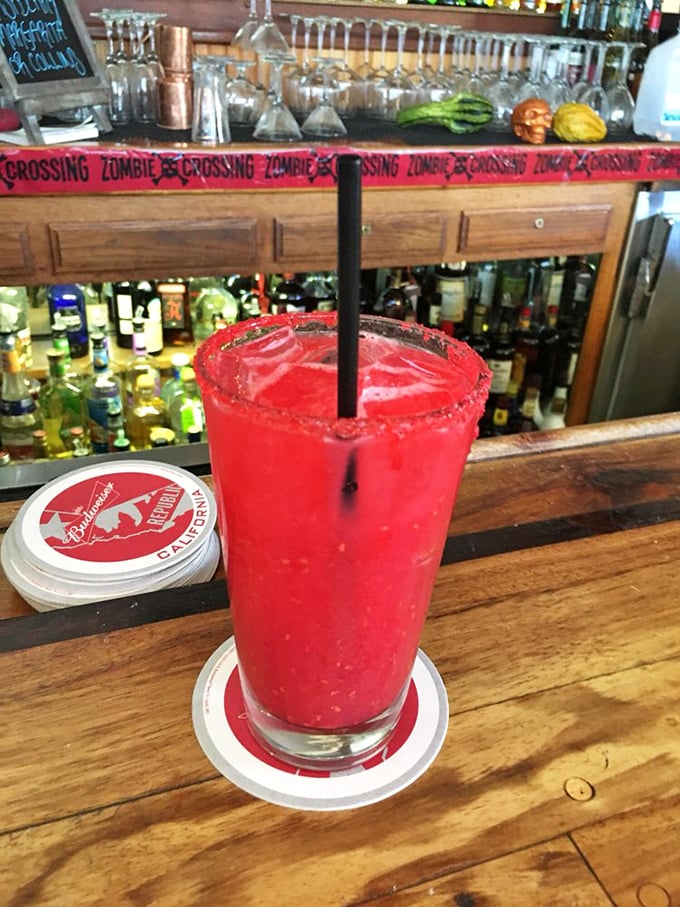 This vibrant red cocktail isn't just a drink&mdash;it's liquid vacation in a glass, rimmed with promises of coastal relaxation and sunset views.