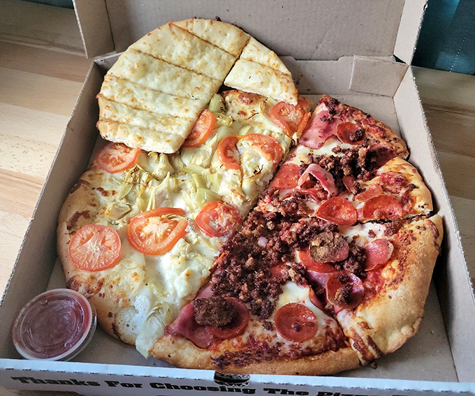 The combination pizza box&mdash;where three distinct pizza personalities coexist in harmony, solving the eternal family topping debate once and for all.