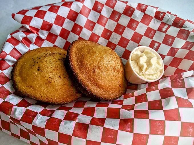 Cornbread that doesn't need your approval but definitely wants your attention. That butter cup is just waiting for its moment.
