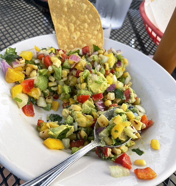 A corn salsa that dances between sweet and savory with the grace of Fred Astaire. Every colorful bite is summer captured in a spoon.