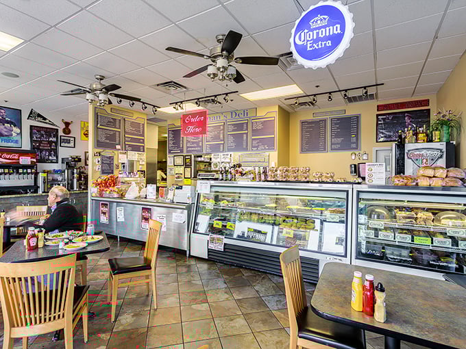 The deli counter &ndash; where dreams are made, orders are called, and the display case showcases edible treasures like a museum of deliciousness.